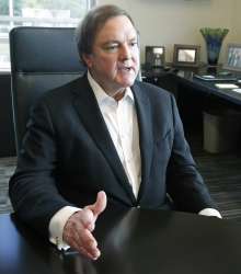 Bruce Bugg of San Antonio suits up for another term as Gov. Abbott's ...